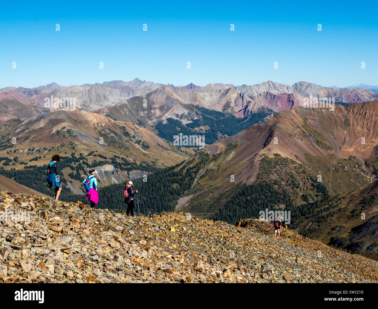 CRESTED BUTTE, COLORADO - SEPTEMBER 20, 2015: Hikers traverse high ...