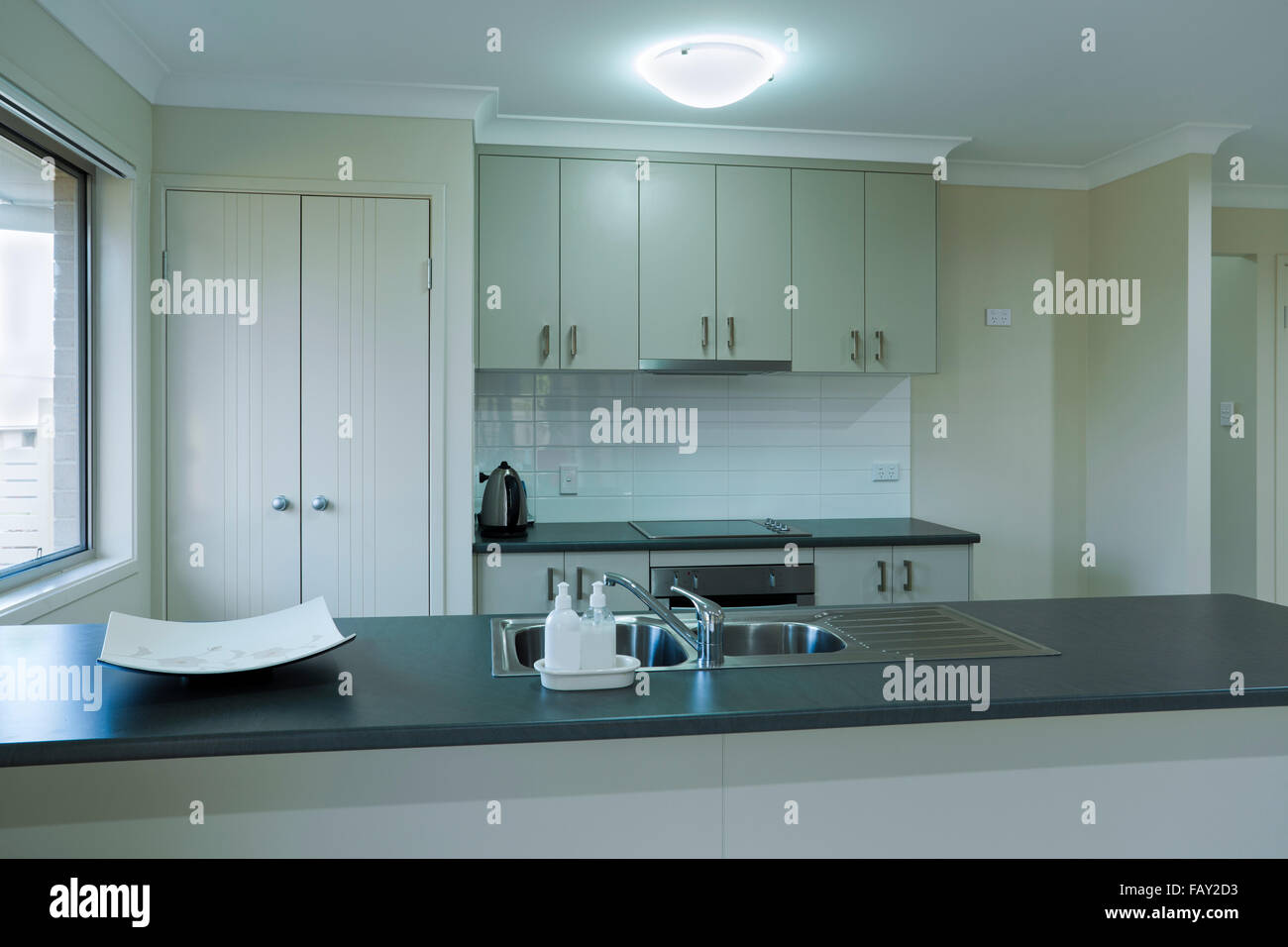 New kitchen in suburban house Stock Photo - Alamy