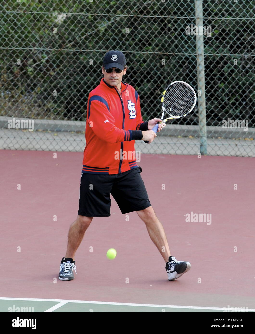 Jon Hamm has a tennis session with his trainer Featuring: Jon Hamm ...