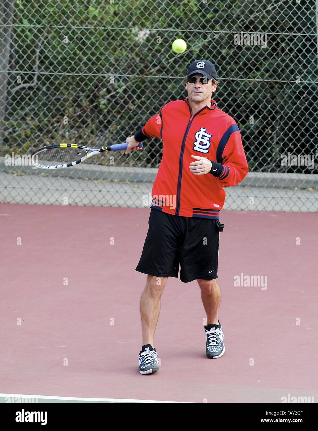 Jon Hamm has a tennis session with his trainer Featuring: Jon Hamm ...