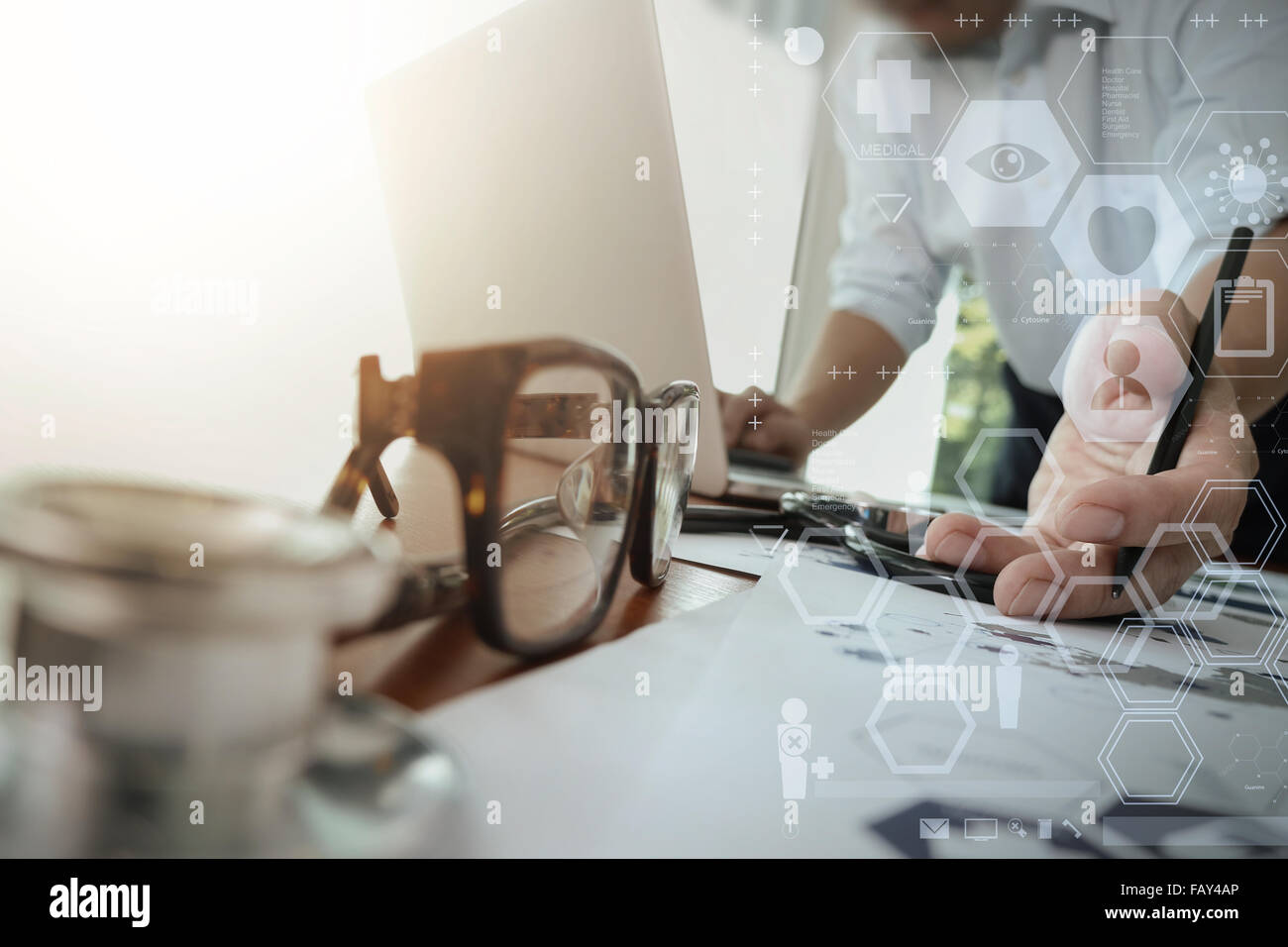 doctor working with laptop computer in medical workspace office and ...