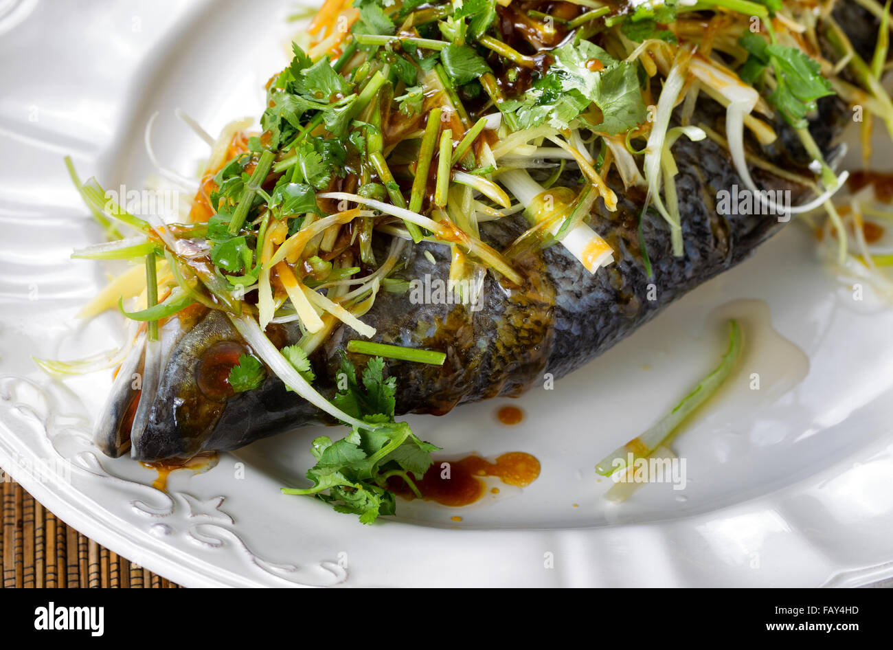 Steamed whole fish chinese dish hi-res stock photography and images - Alamy