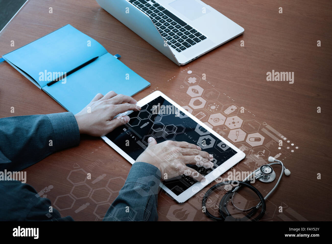top view of Medicine doctor hand working with modern computer and ...