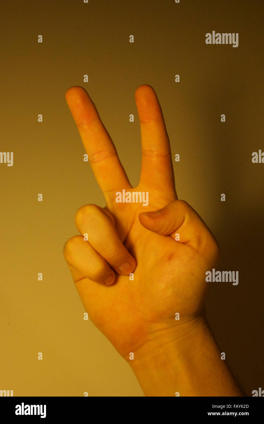 Two fingers v sign hi-res stock photography and images - Alamy
