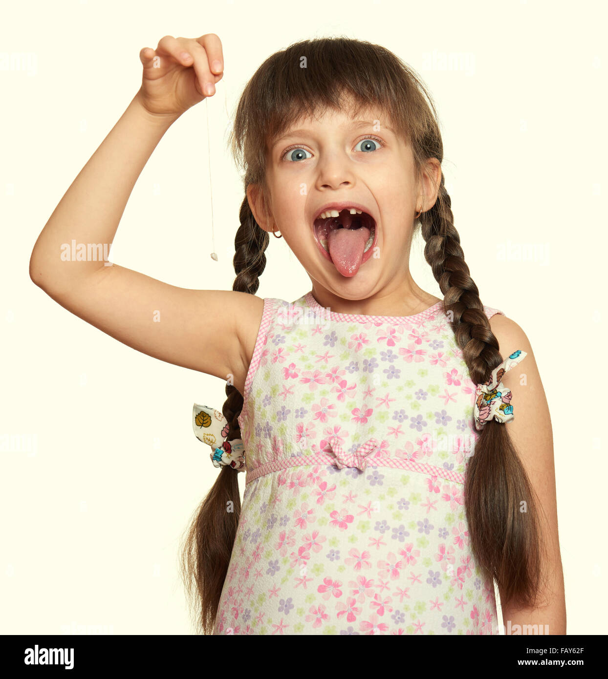 lost tooth girl portrait, studio shoot on white background Stock Photo ...