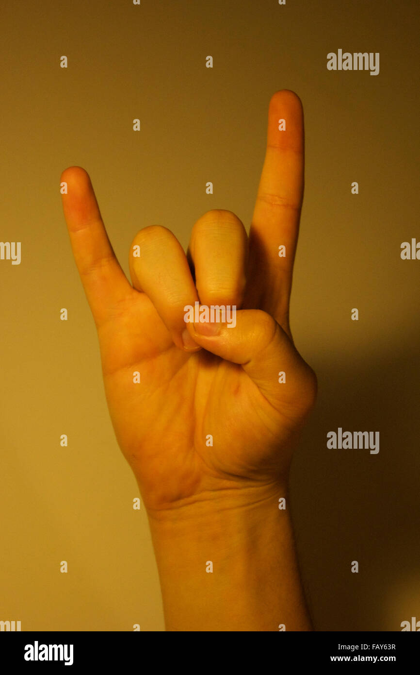 Devil hand sign hi-res stock photography and images - Alamy