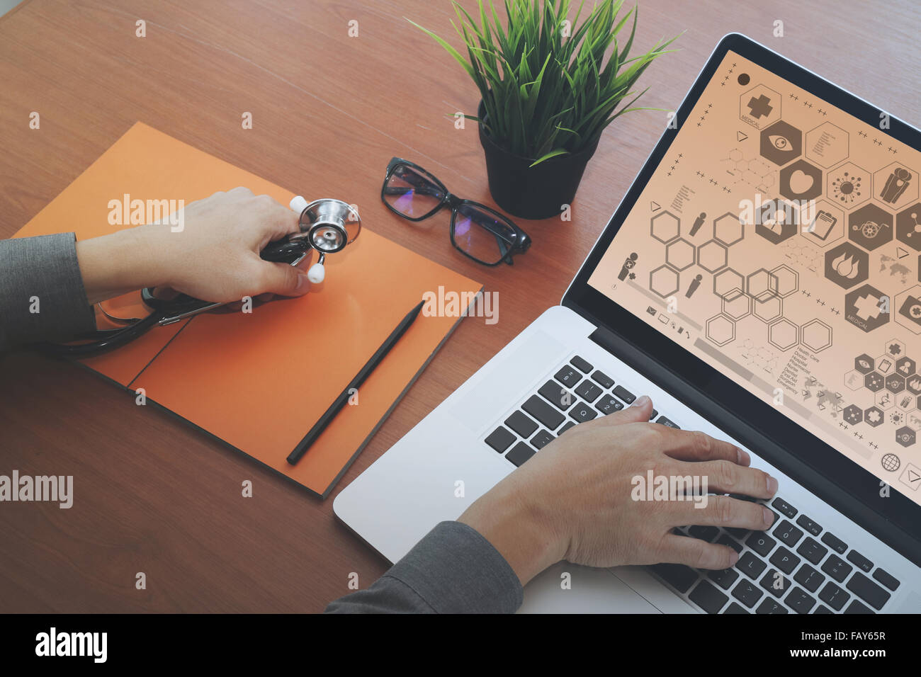 top view of Medicine doctor hand working with modern computer and smart ...