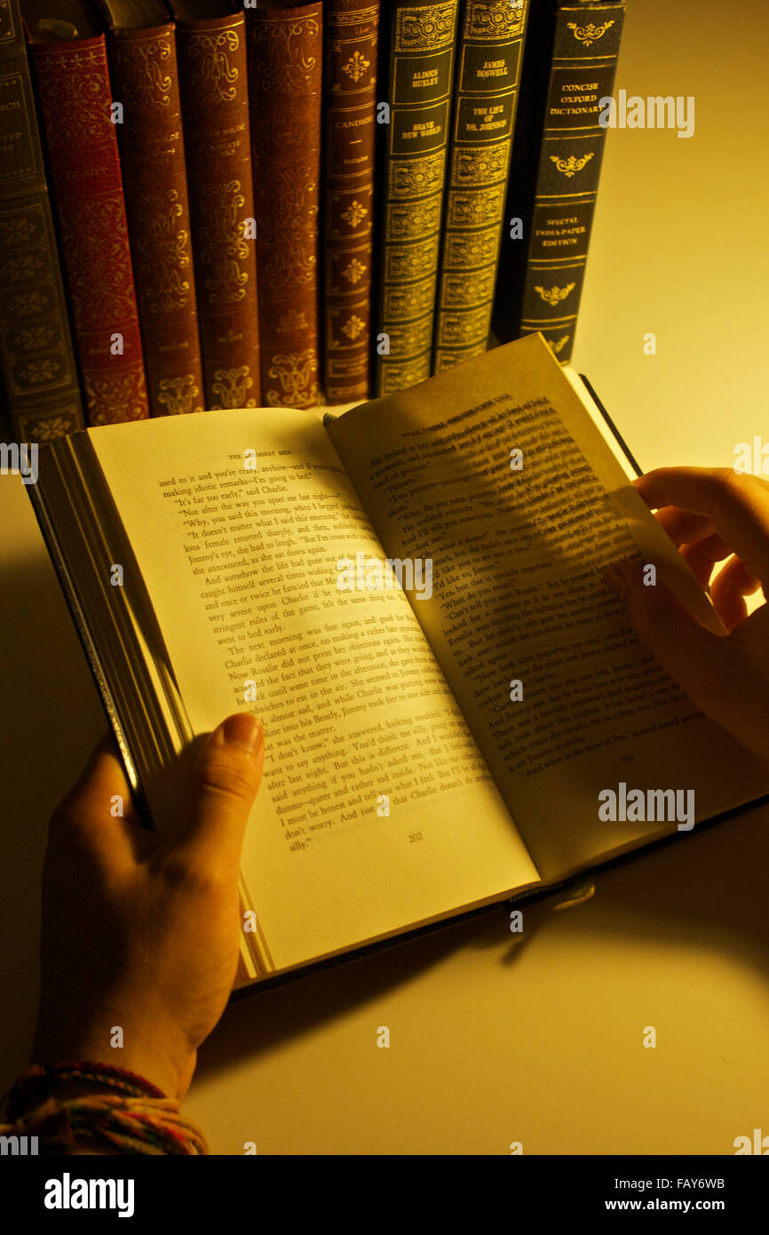 Reading a book Stock Photo - Alamy