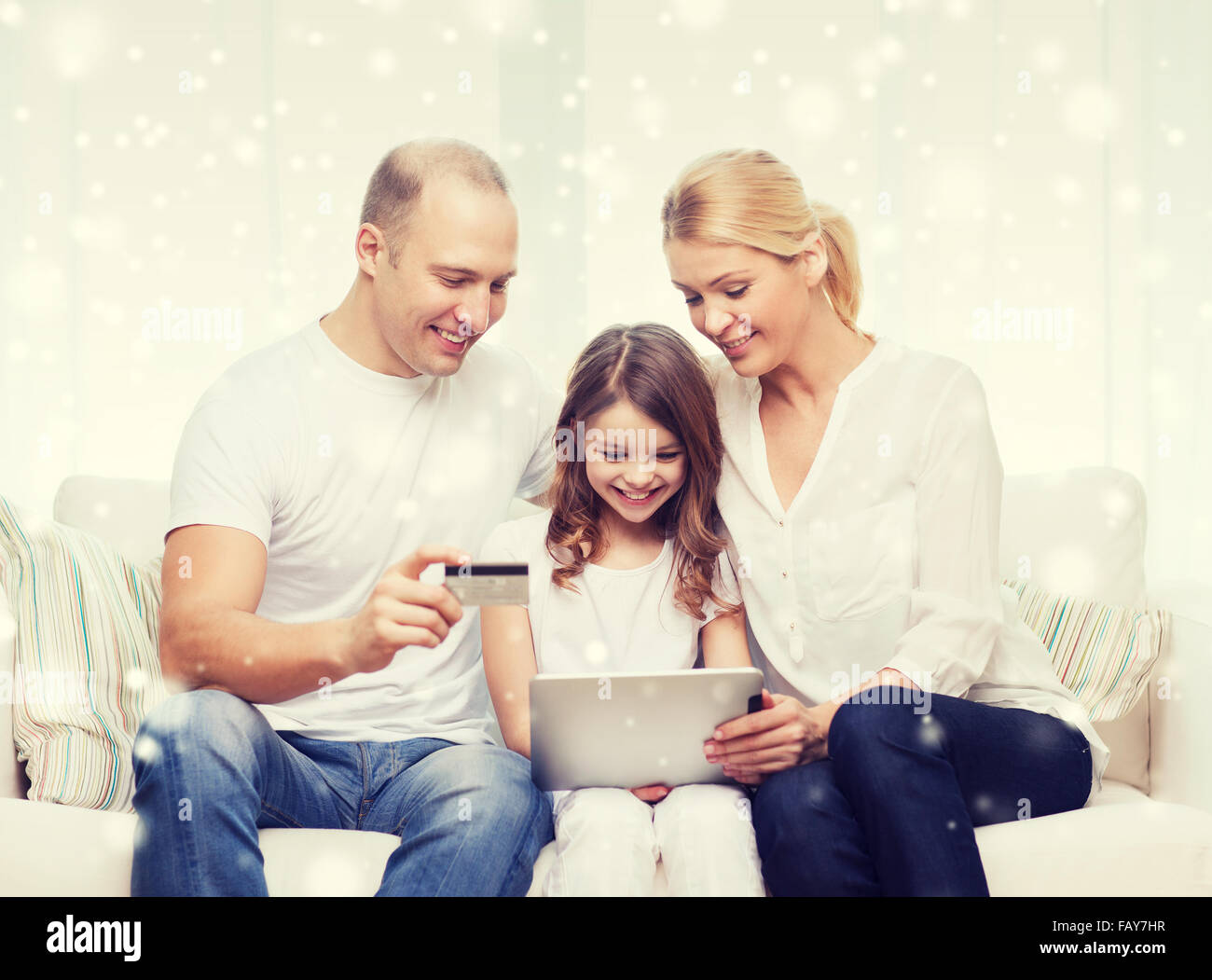 happy family with tablet pc and credit card Stock Photo - Alamy