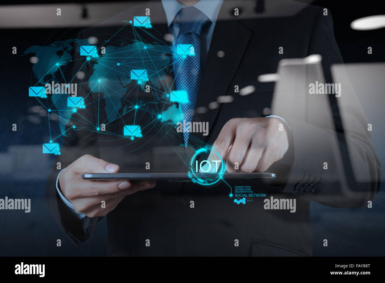 double exposure of hand showing Internet of things (IoT) word diagram ...