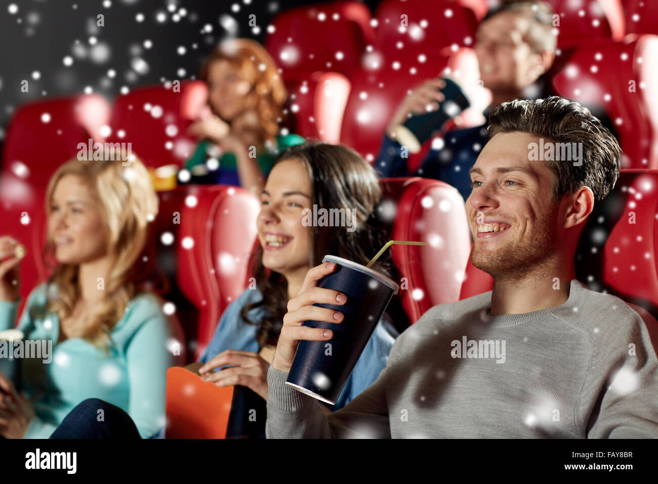 happy friends with popcorn and drinks in cinema Stock Photo - Alamy