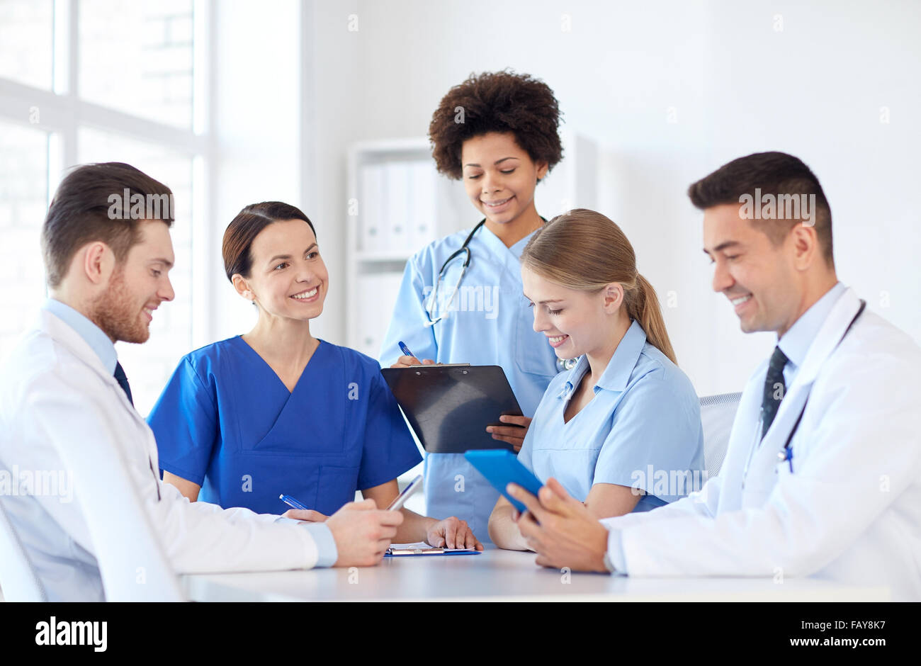 group of happy doctors meeting at hospital office Stock Photo - Alamy