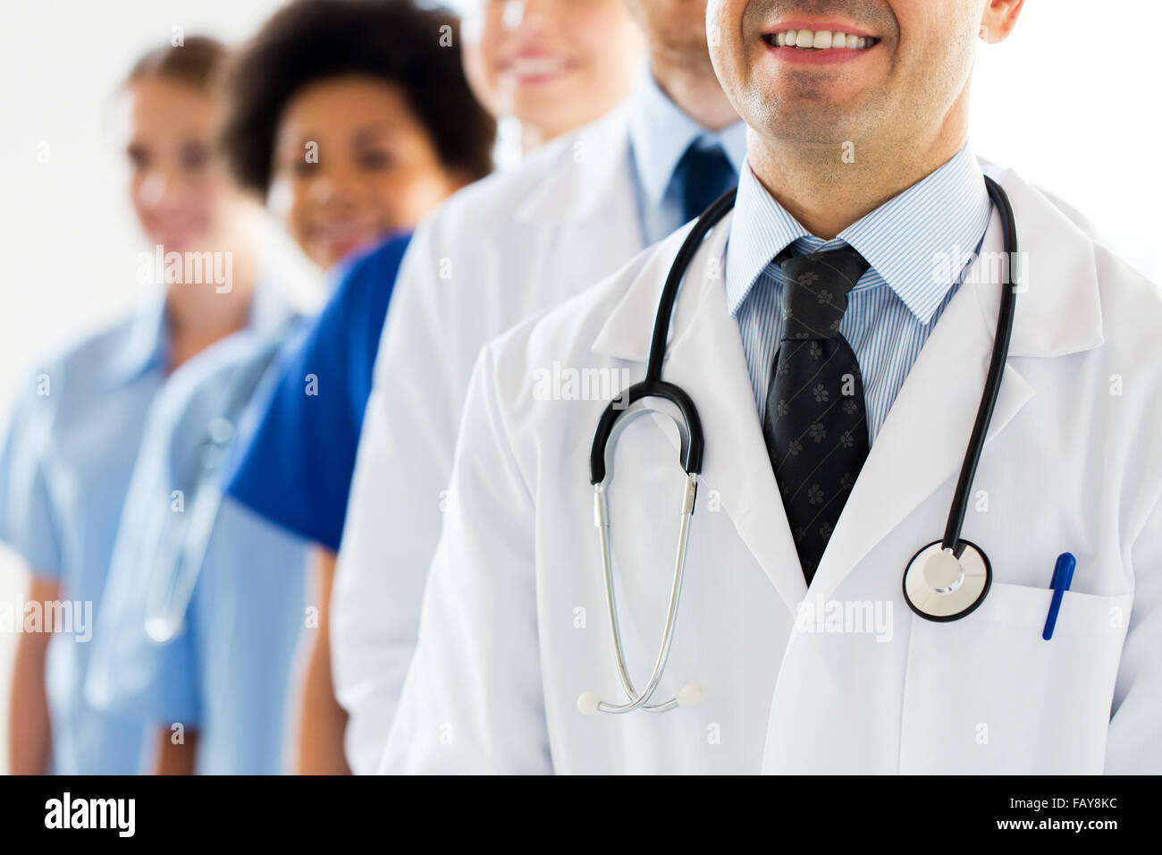 close up of happy doctors with stethoscope Stock Photo - Alamy