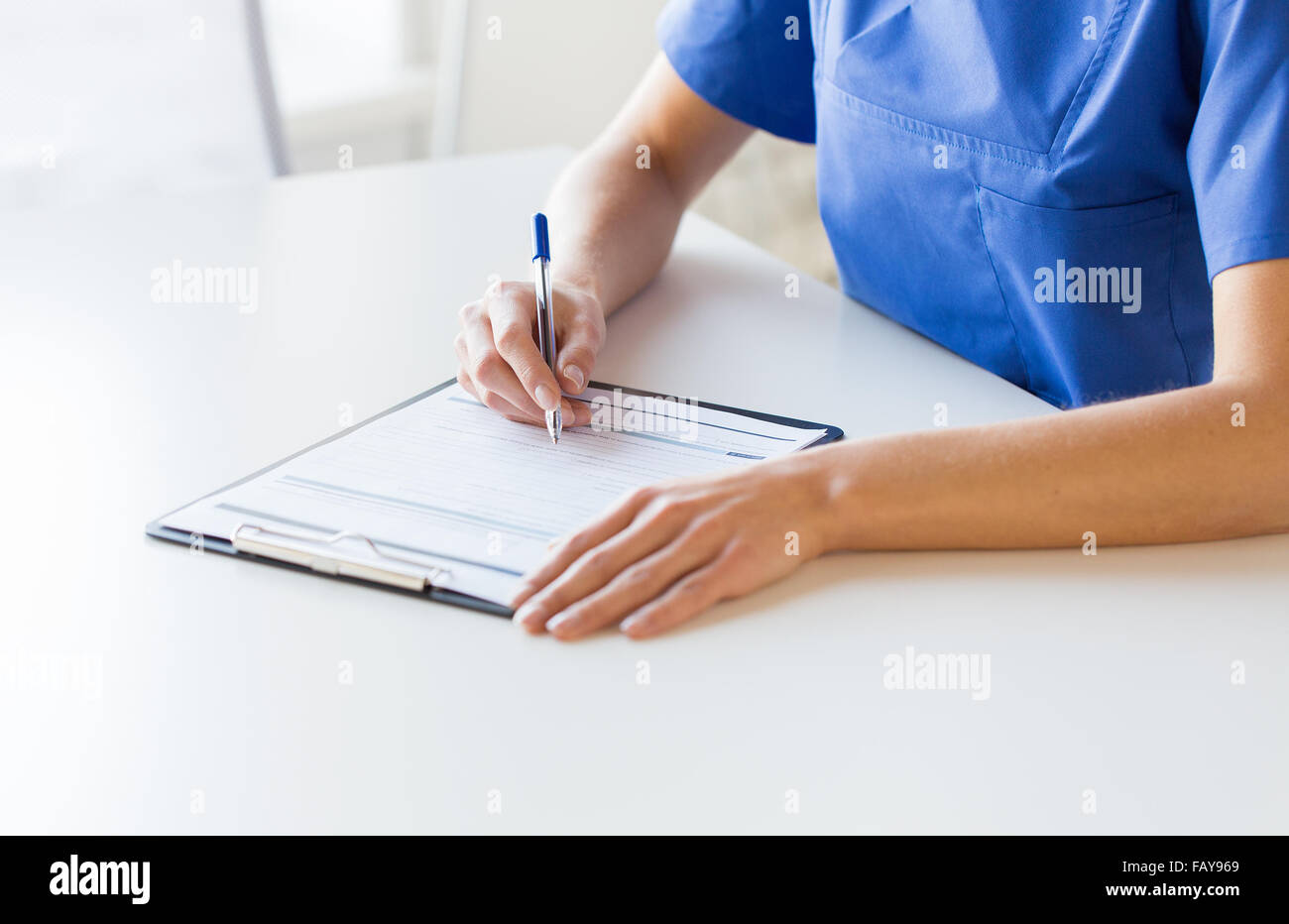 Nurse writing notes hi-res stock photography and images - Alamy