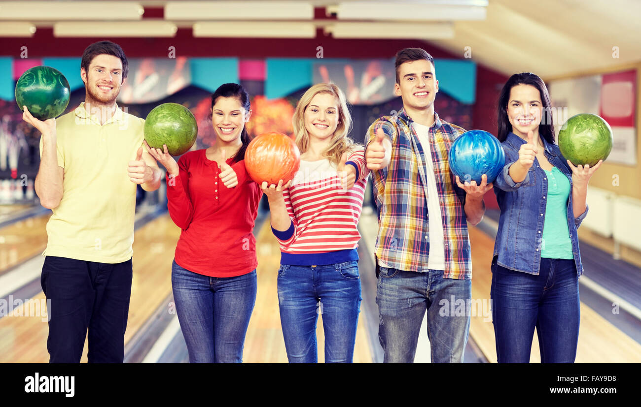 happy friends in bowling club Stock Photo - Alamy
