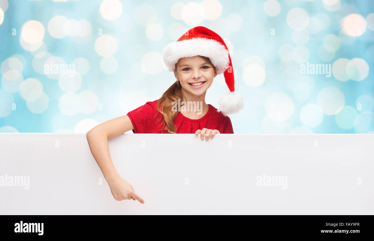 child in santa helper hat with blank white board Stock Photo - Alamy
