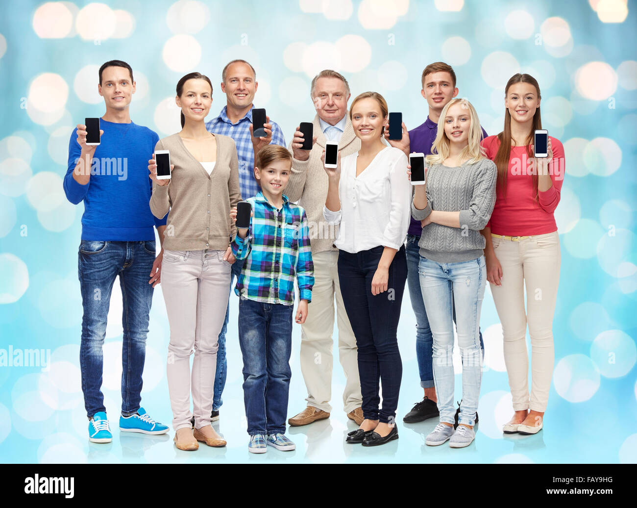 group of smiling people with smartphones Stock Photo - Alamy