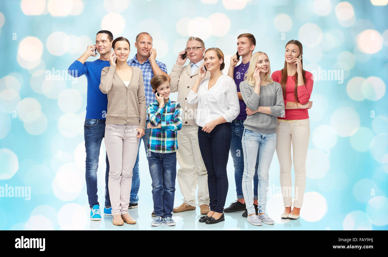 group of smiling people with smartphones Stock Photo - Alamy