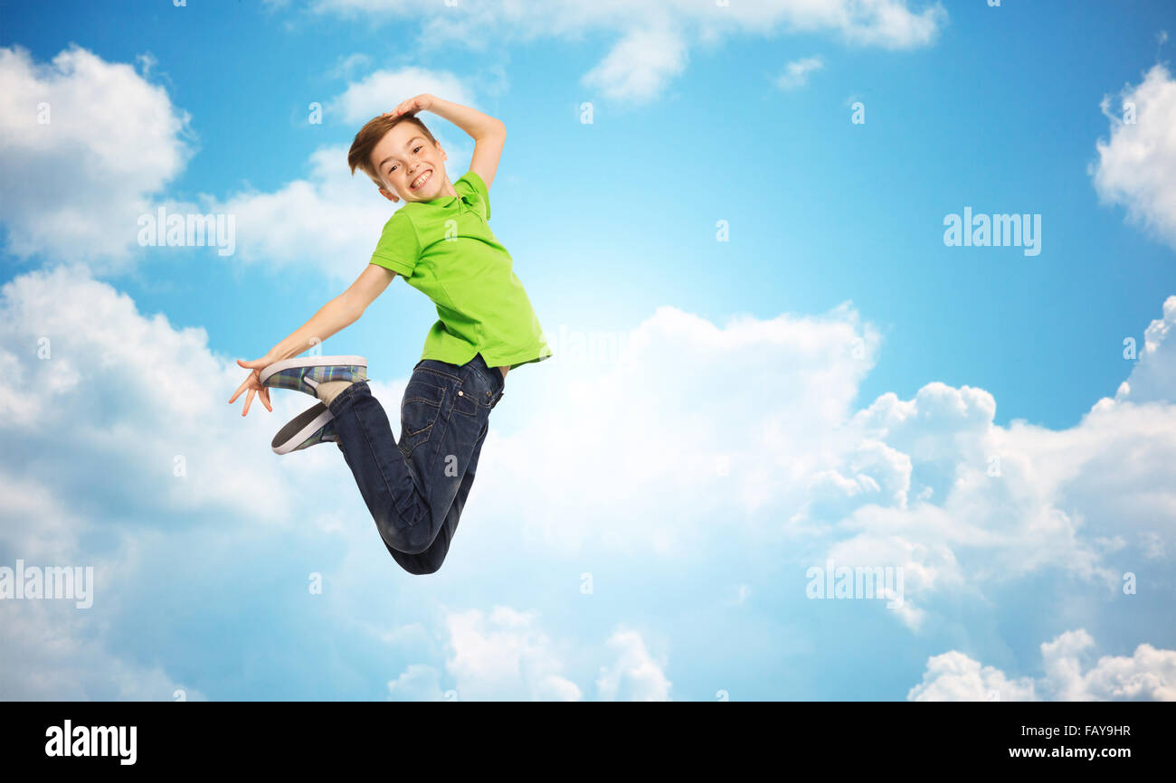 smiling boy jumping in air Stock Photo - Alamy
