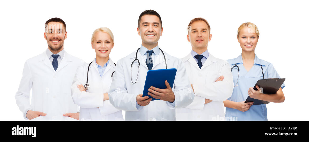 group of doctors with tablet pc and clipboard Stock Photo - Alamy