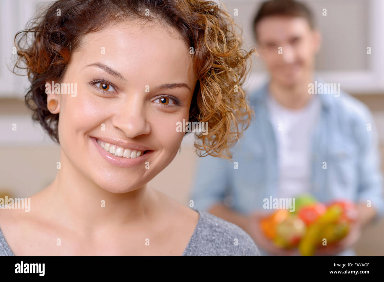 Loving couple cooking together Stock Photo - Alamy