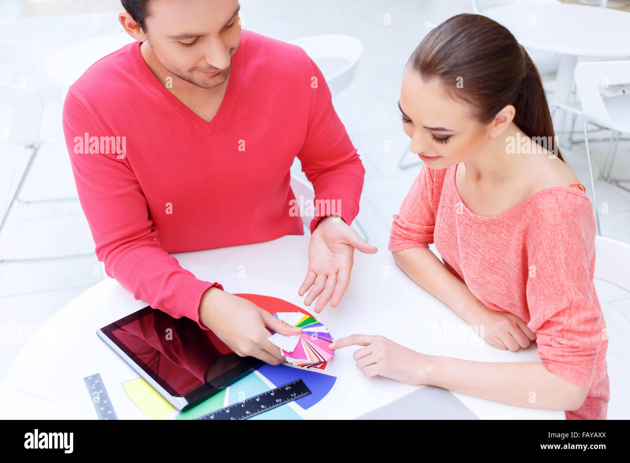 Female designer picks the color she approves Stock Photo - Alamy