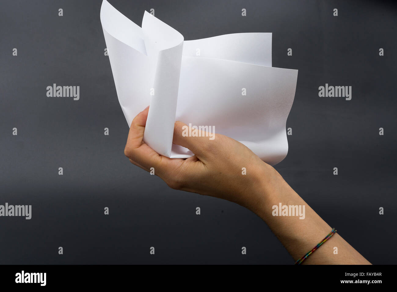 Hand crumpling hi-res stock photography and images - Alamy