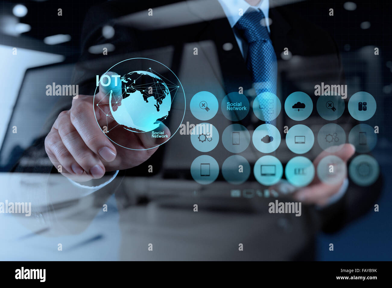 double exposure of hand showing Internet of things (IoT) word diagram ...