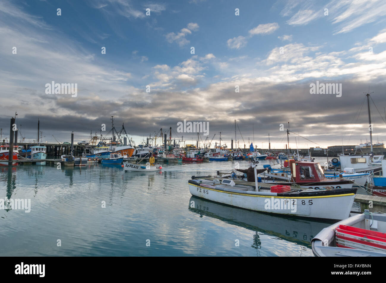 Wide angle blue reflection fishing fleet trawlers sky water hi-res ...