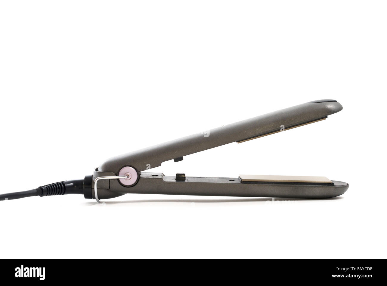 Ceramic hair straightener on white background Stock Photo - Alamy