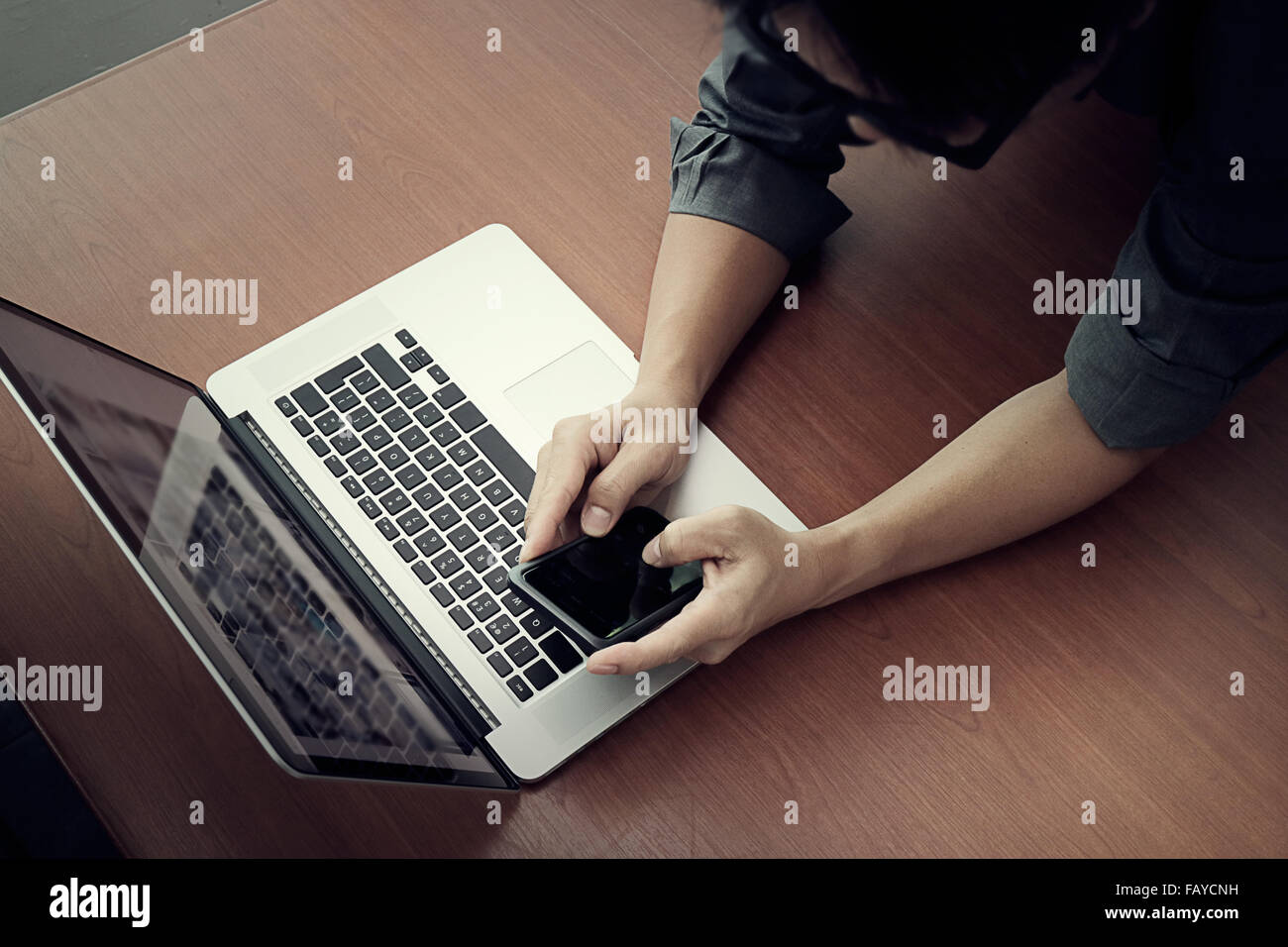 top view of businessman hand working with new modern computer and smart ...