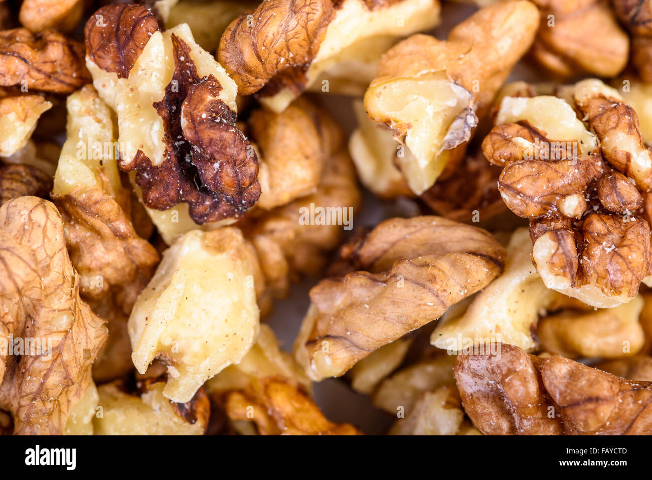 Pile Of Walnuts Close Up Stock Photo - Alamy