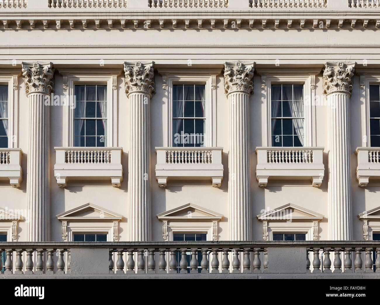 Corinthian columns on building facade in the Mall; London, England ...