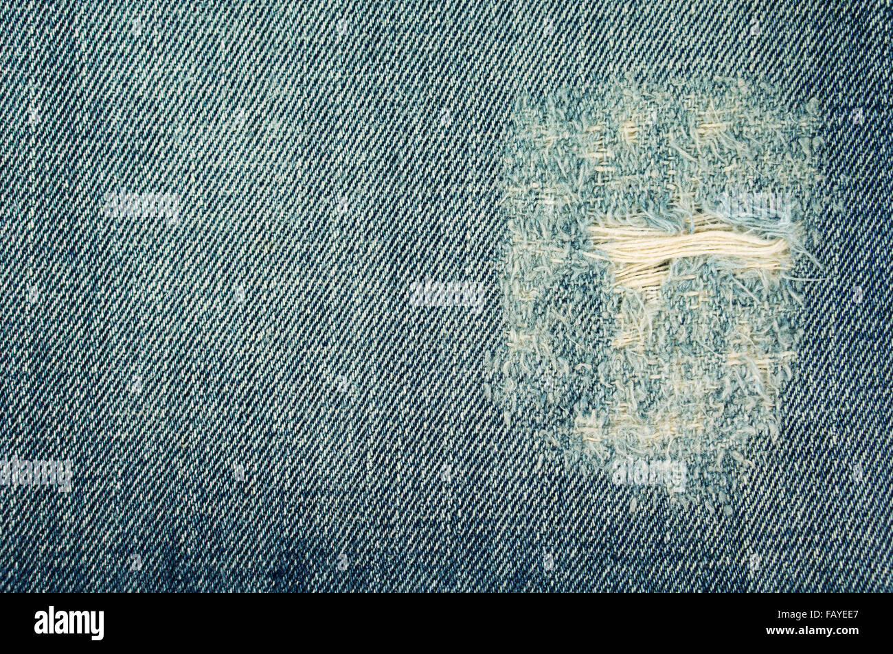 Ripped jeans texture and background Stock Photo - Alamy