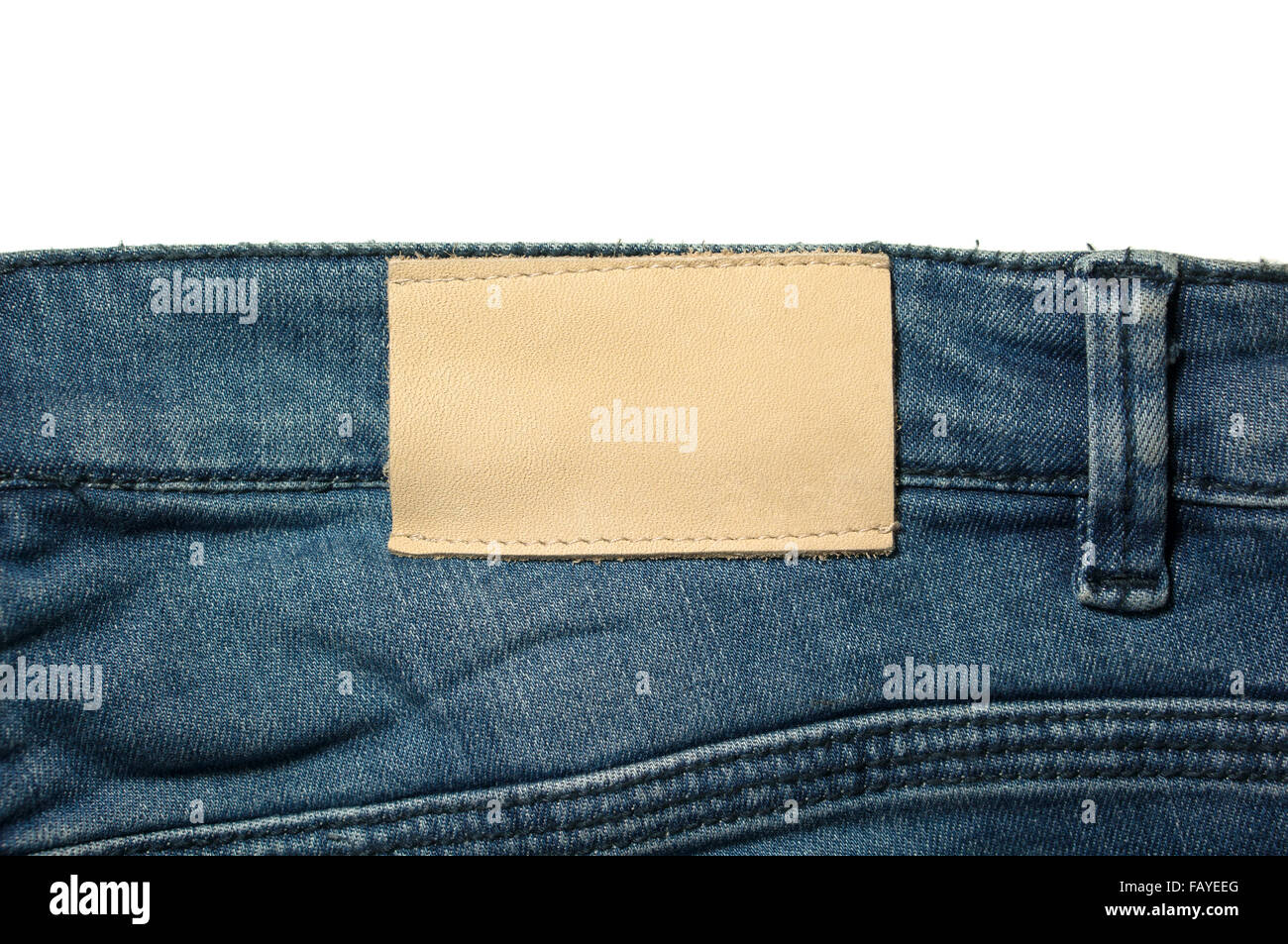 White leather label on jeans isolated on white background Stock Photo ...