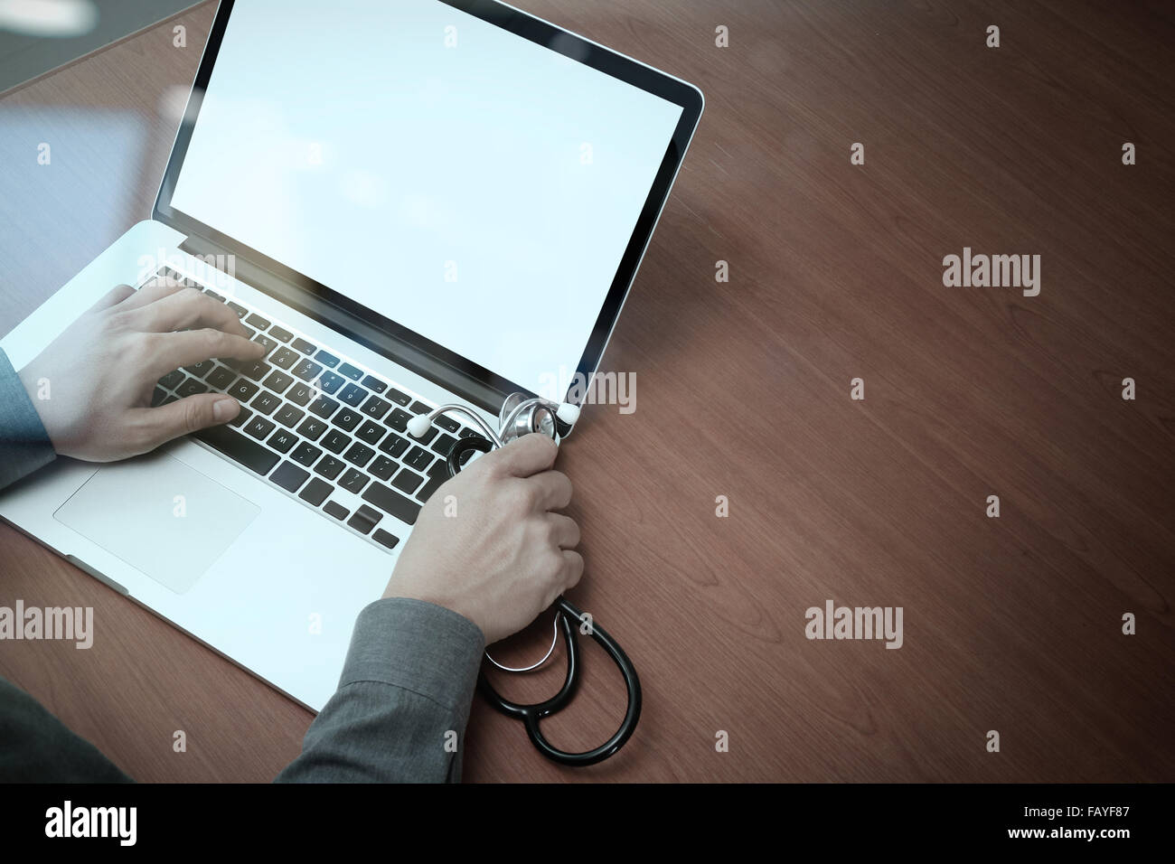 top view of Medicine doctor hand working with modern computer and smart ...