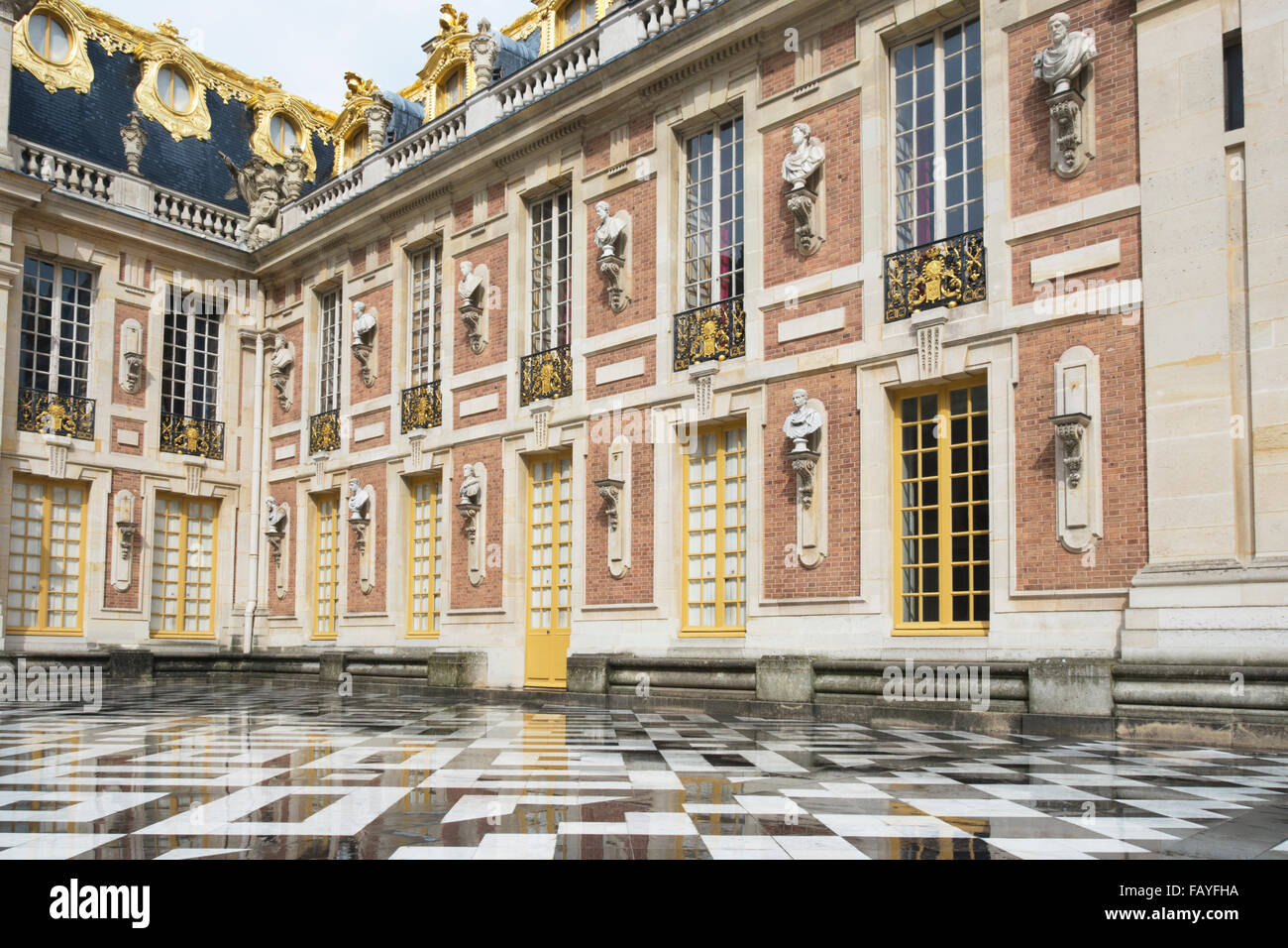 Chateau de Versailles, entrance courtyard with black and white tiled ...