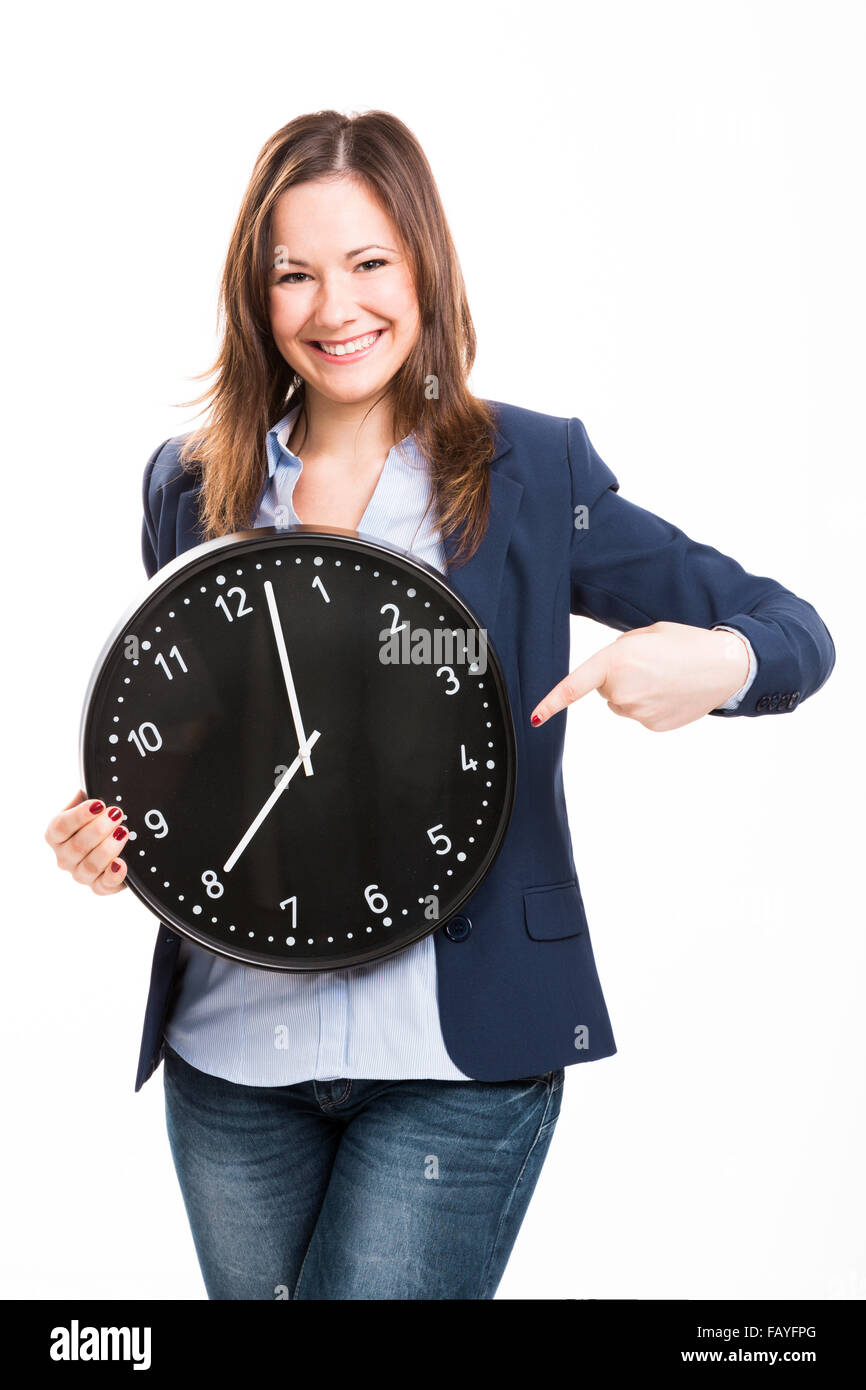 Woman pointing to clock hi-res stock photography and images - Alamy