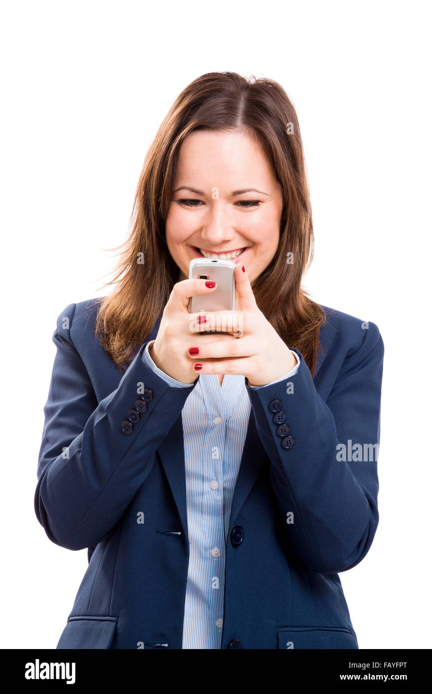Business woman with a cellphone texting, isolated over white background ...