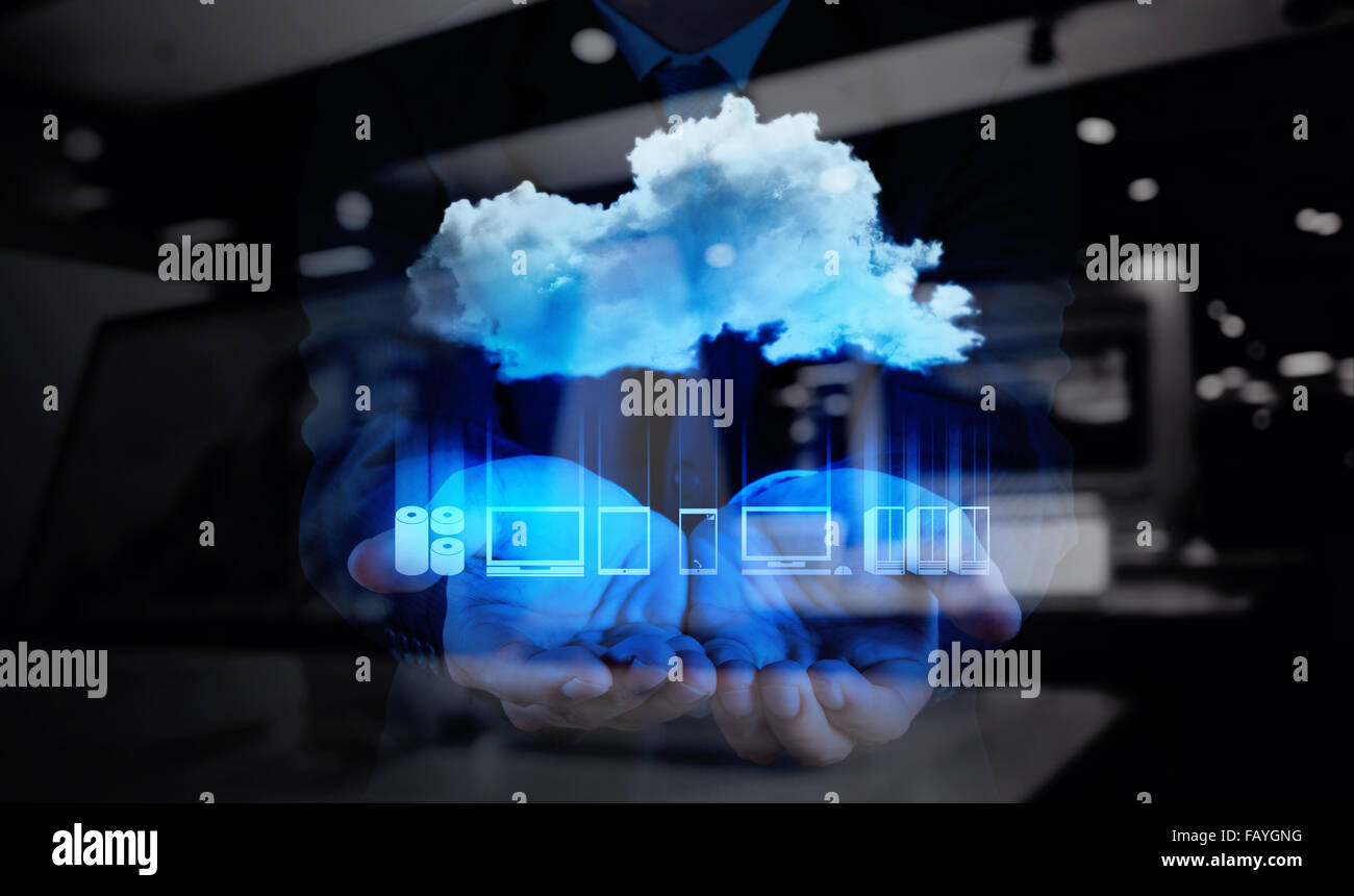 Businessman hand working with a Cloud Computing diagram on the new ...