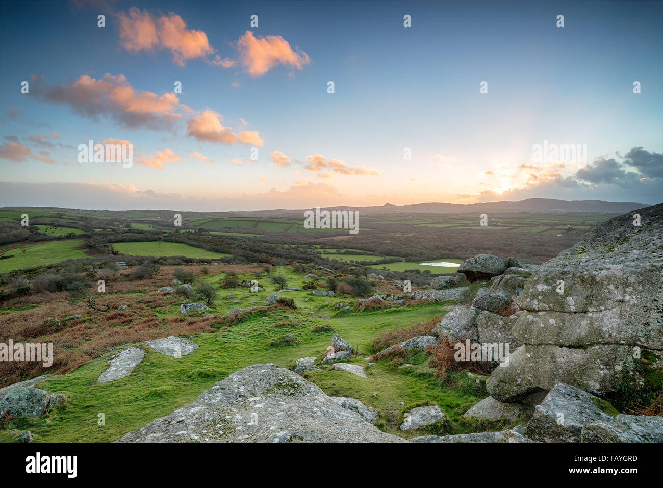 Sunset over the Cornish countryside from Helman Tor an ancient hill ...