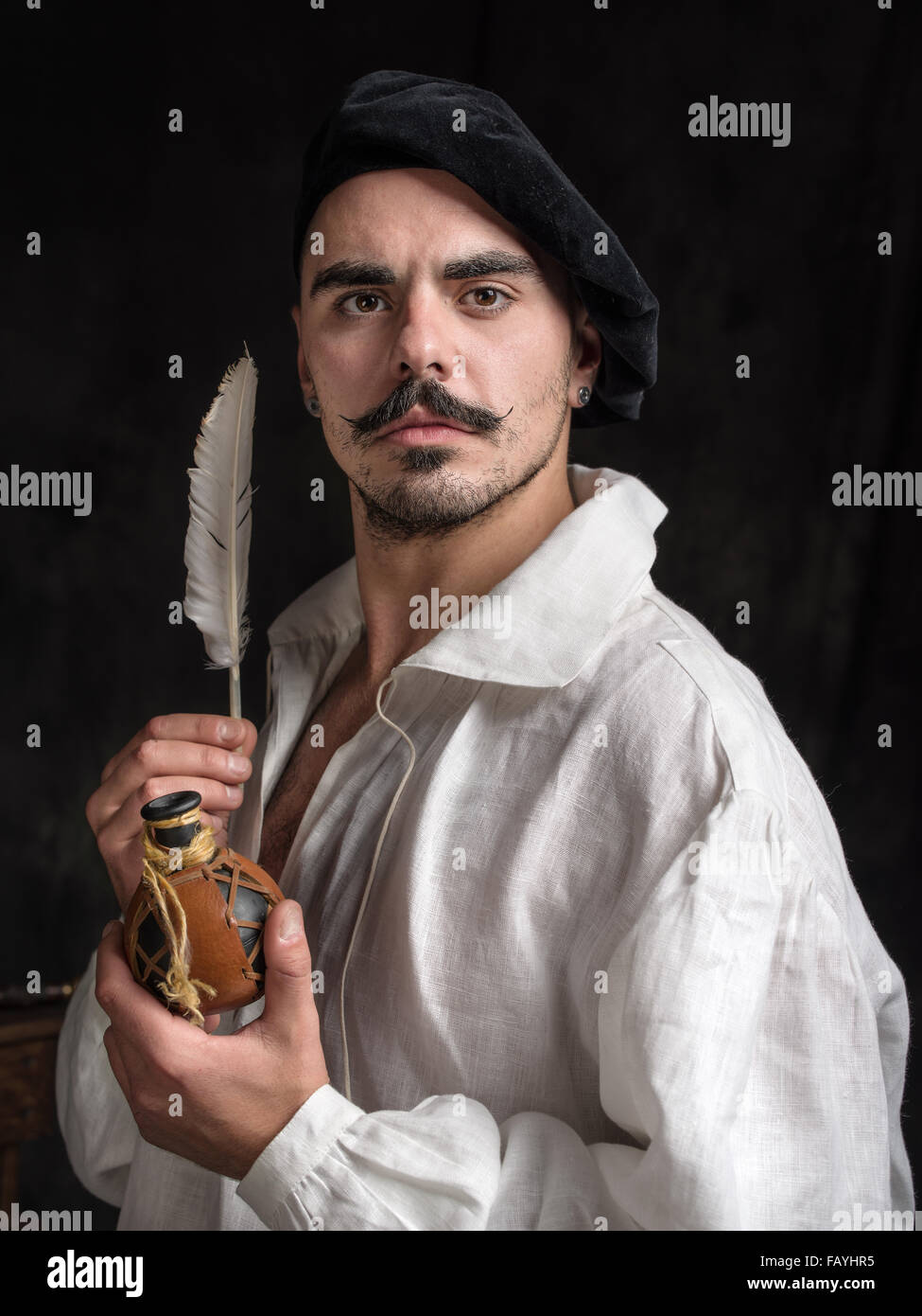 Portrait of the Poet. A man in a white shirt and wearing a hat ...