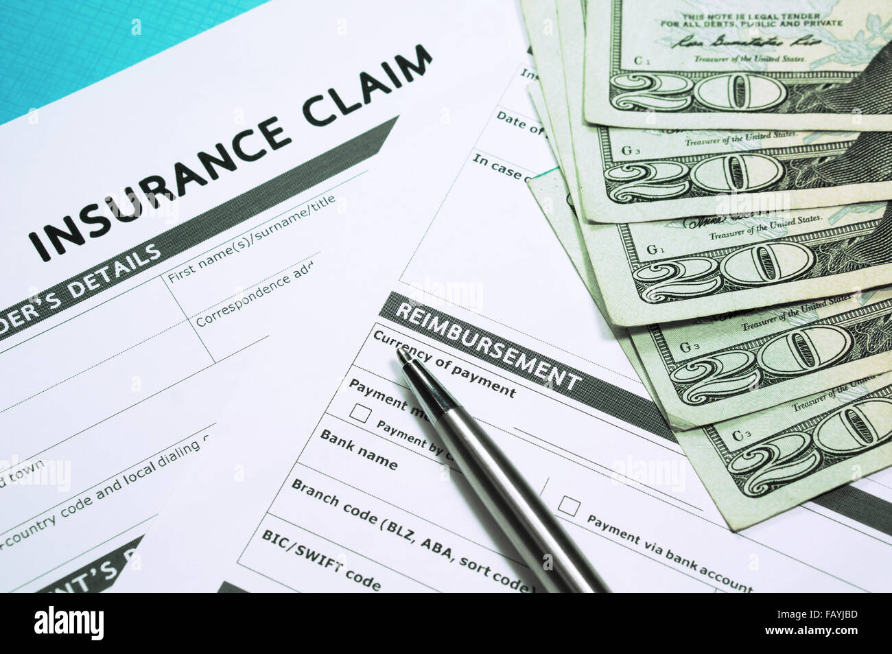 Insurance concept with insurance claim form and money Stock Photo - Alamy