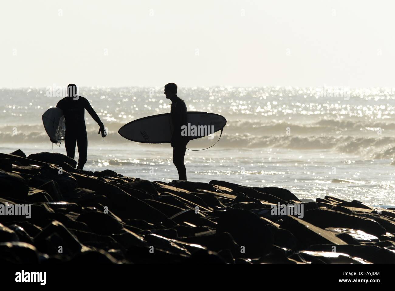 Surfing in the the sunshine at Kimmeridge Bay in Dorset, Britain, UK ...