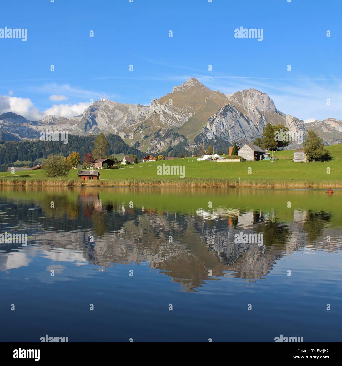 Alpstein range mirroring in lake Schwendisee Stock Photo - Alamy