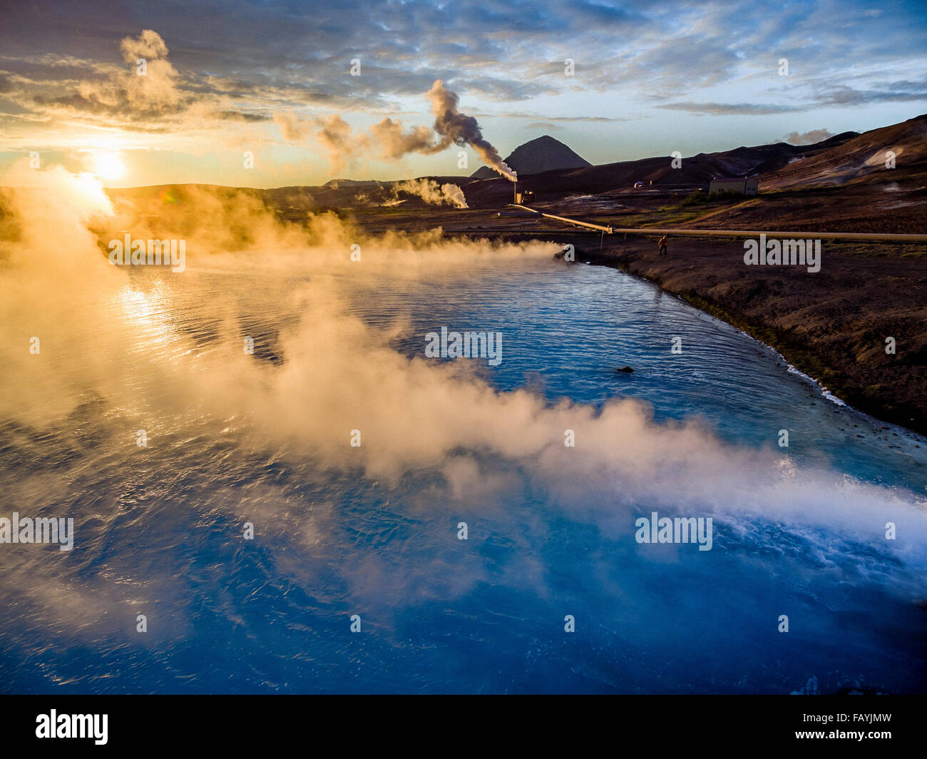 Steaming landscape and pipes at Bjarnarflag Geothermal Plant, Iceland ...