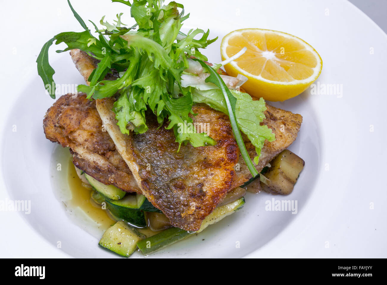 White fish cooked hi-res stock photography and images - Alamy
