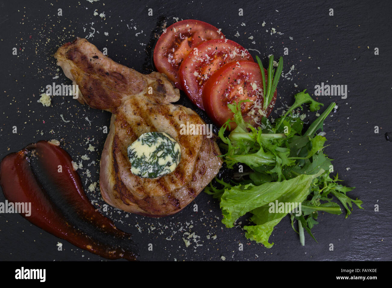 Grilled pork chop with vegetables, top view Stock Photo - Alamy