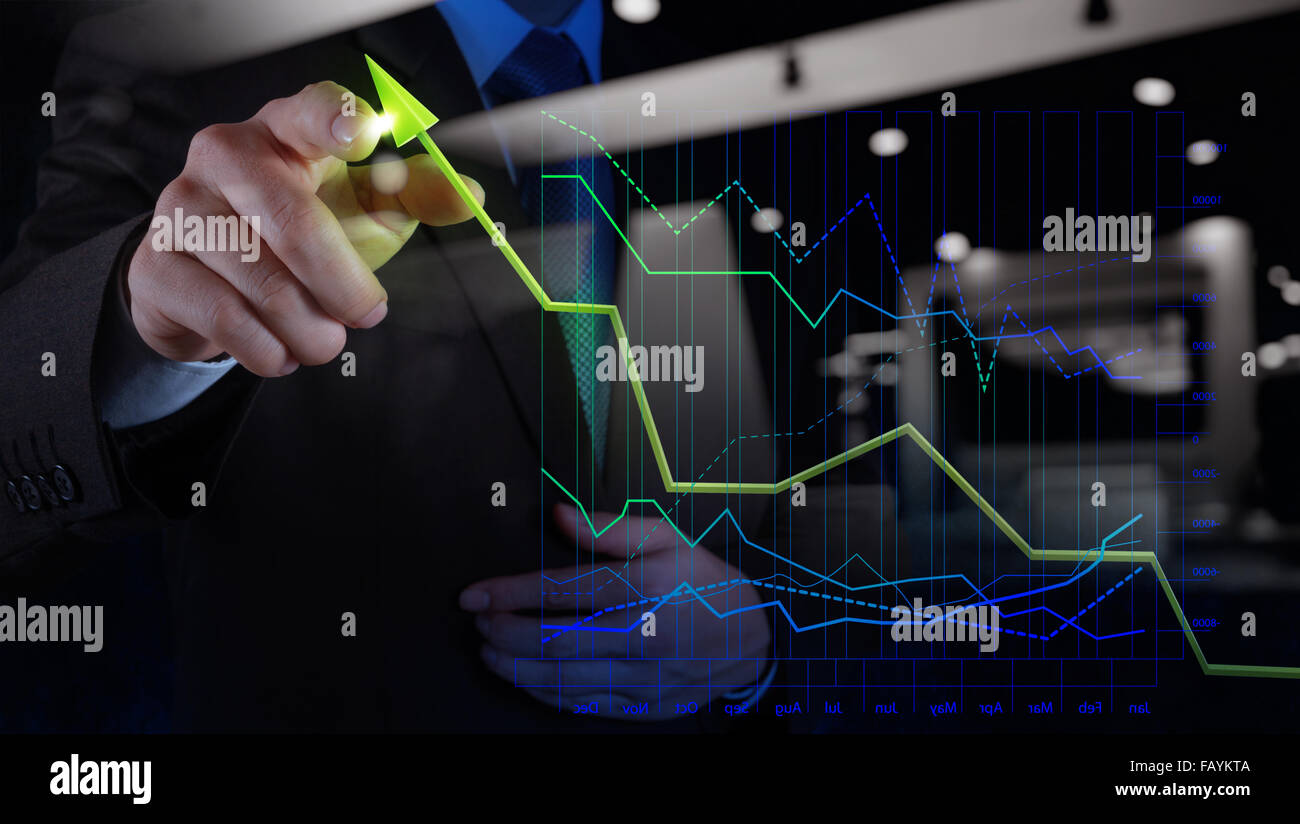 double exposure of businessman hand drawing virtual chart business on ...