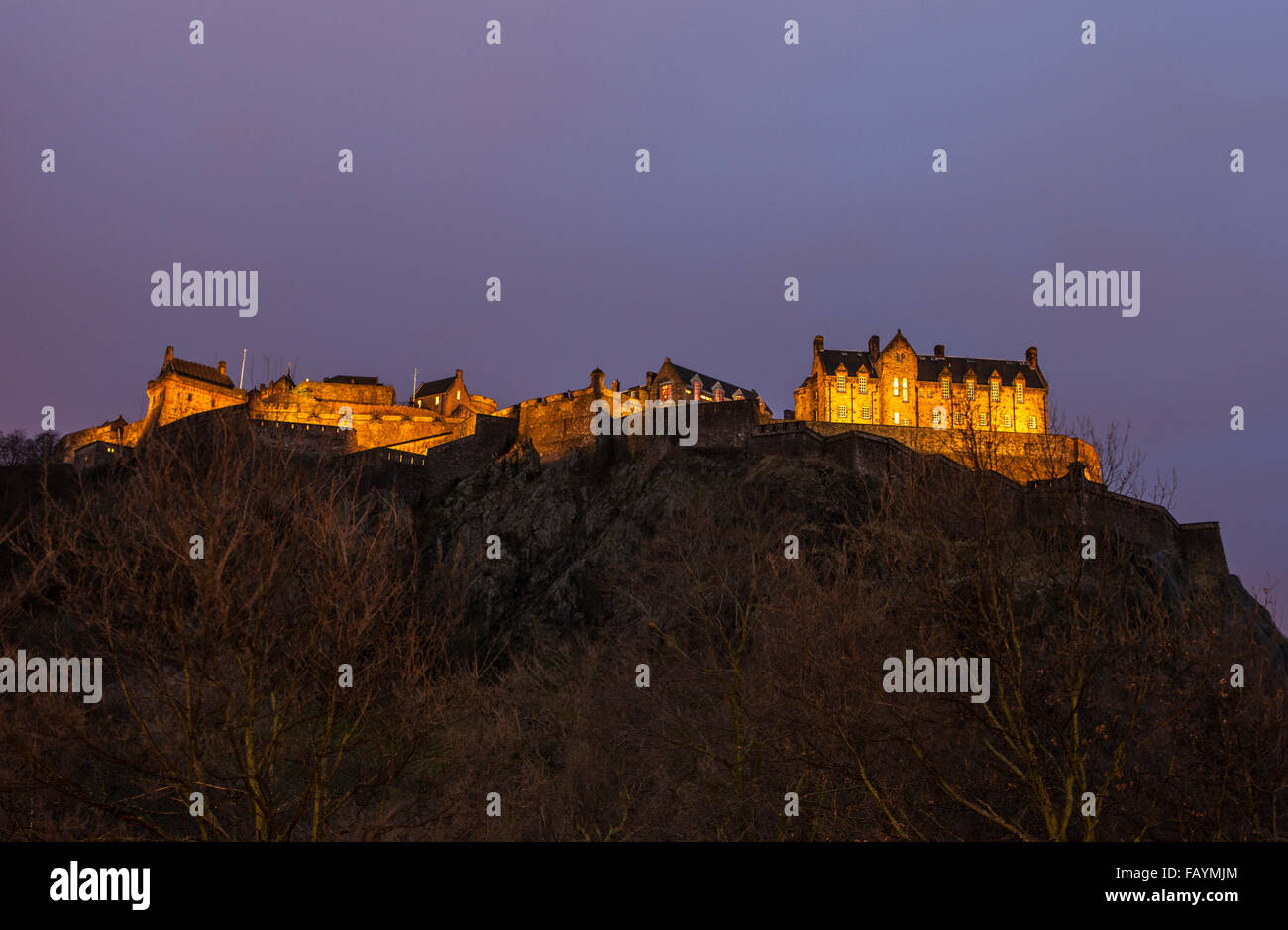 A dusk-time view of the magnificent Edinburgh Castle in Scotland Stock ...
